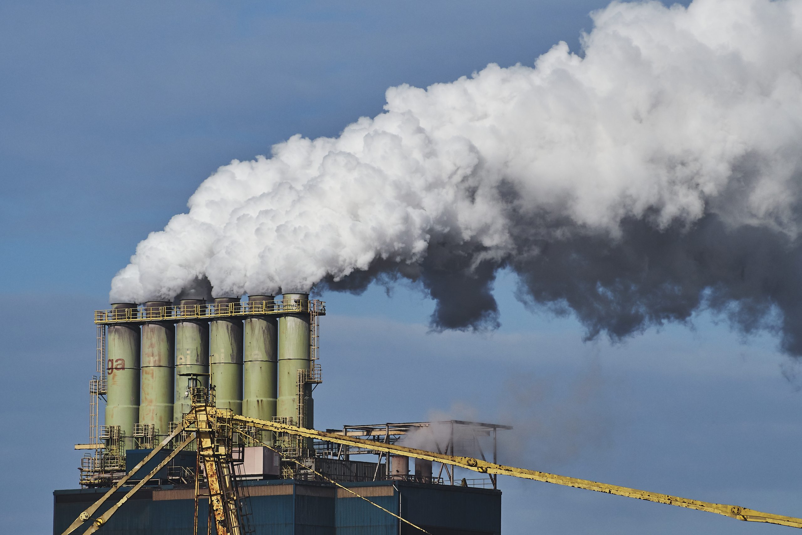 Smoke coming out of factories in an industrial area – INTI ...